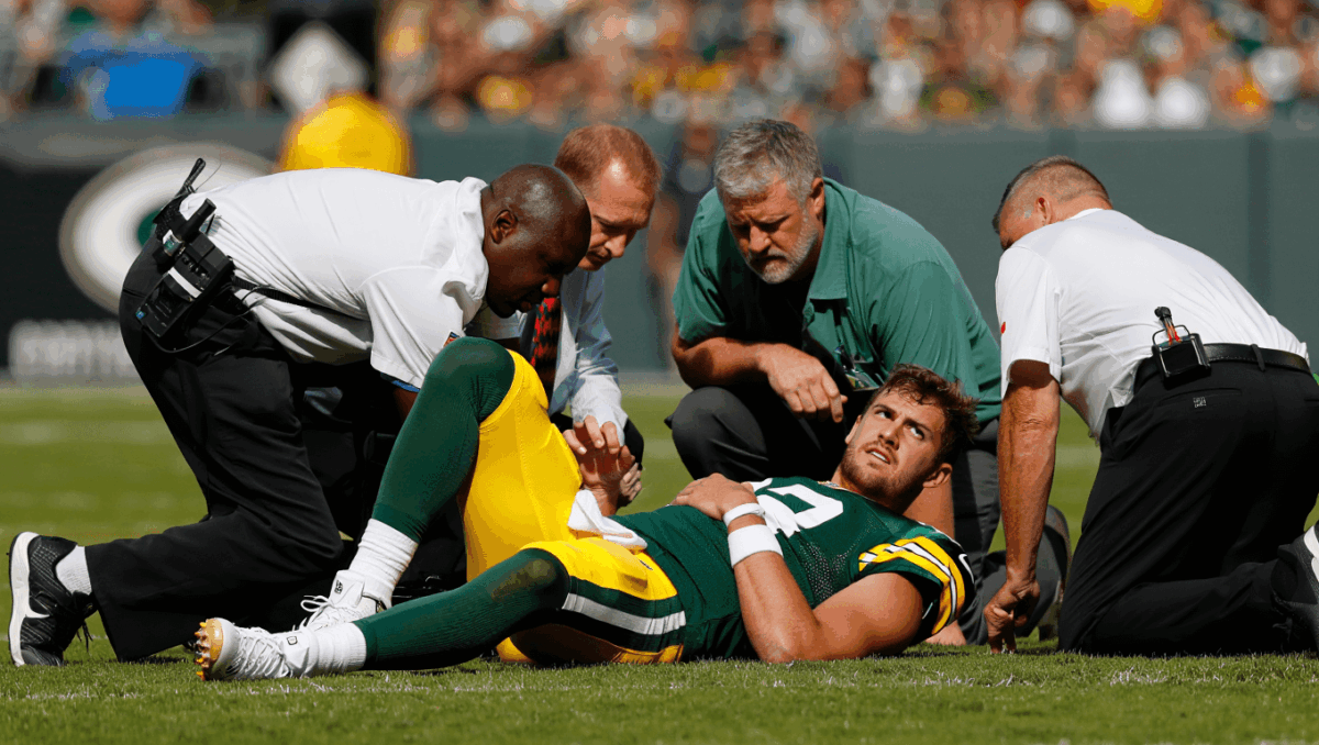 Jordan Love exits game after brutal helmet-to-helmet hit, concussion ...